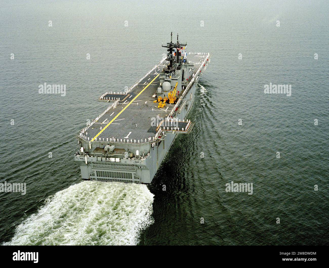 A stern view of the amphibious assault ship USS WASP (LHD 1) underway ...