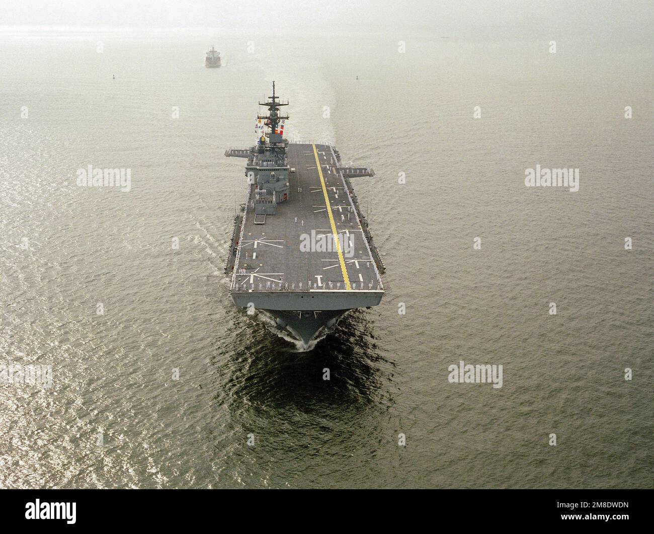 A bow view of the amphibious assault ship USS WASP (LHD 1) underway ...