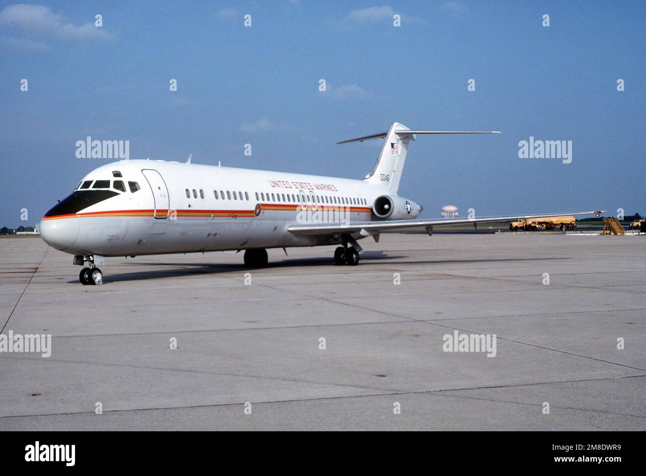 A left side view of a Marine Corps C-9B Skytrain II aircraft parked on ...