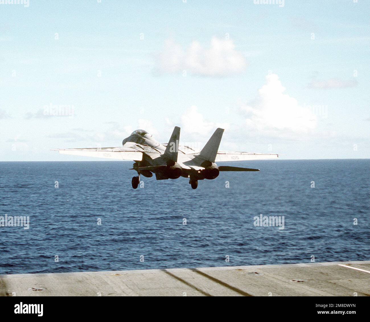 A Fighter Squadron 114 (VF-114) F-14A Tomcat aircraft takes to the air ...