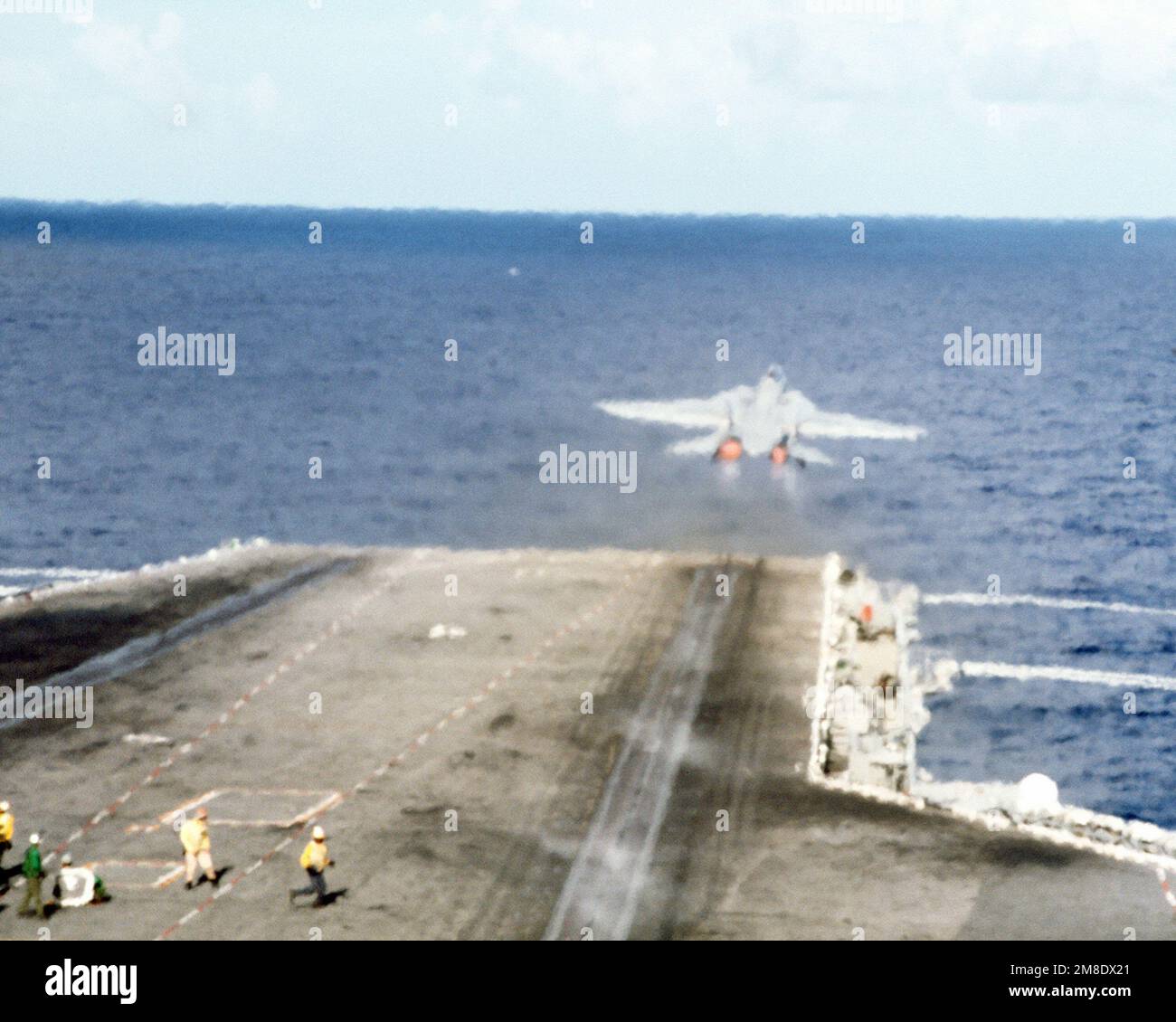 A Fighter Squadron 114 (VF-114) F-14A Tomcat aircraft leaves the flight ...