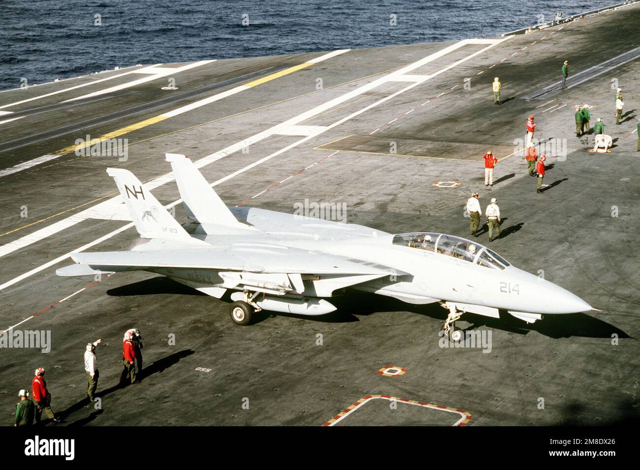 A Fighter Squadron 213 (VF-213) F-14A Tomcat aircraft taxis into ...