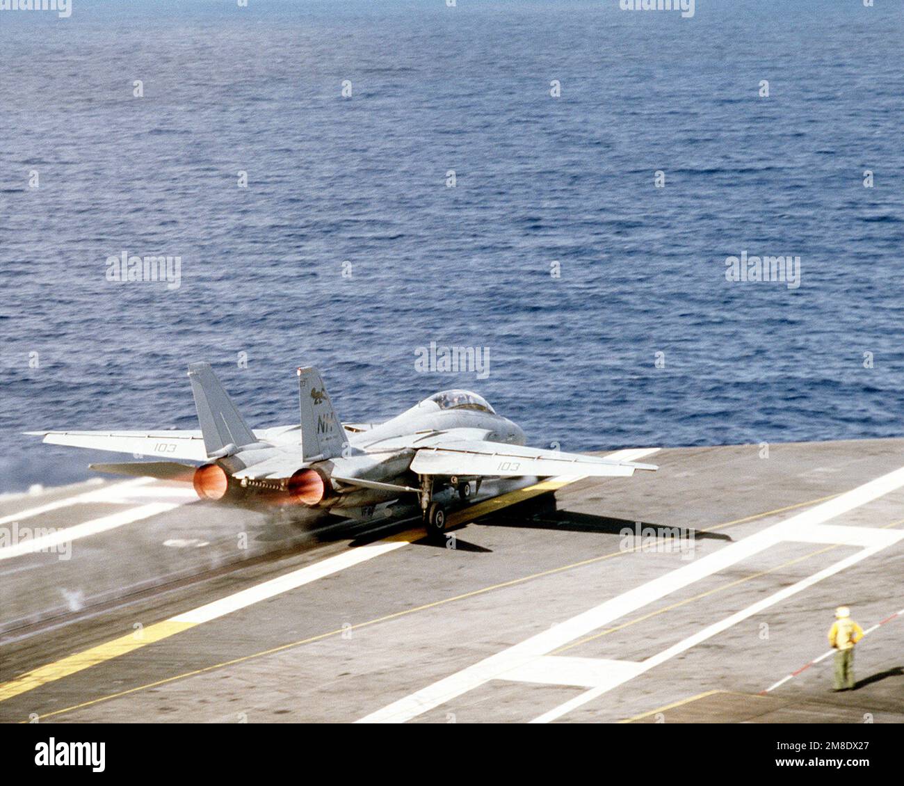 A Fighter Squadron 114 (VF-114) F-14A Tomcat aircraft is launched from ...
