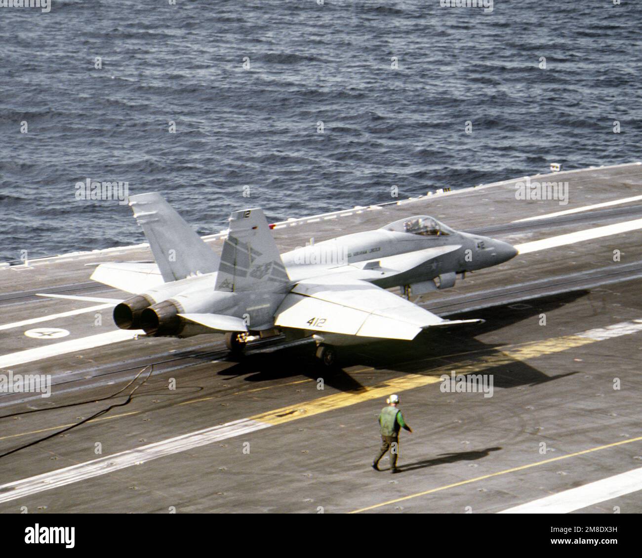 A Strike Fighter Squadron 305 (VFA-305) F/A-18 Hornet aircraft releases ...