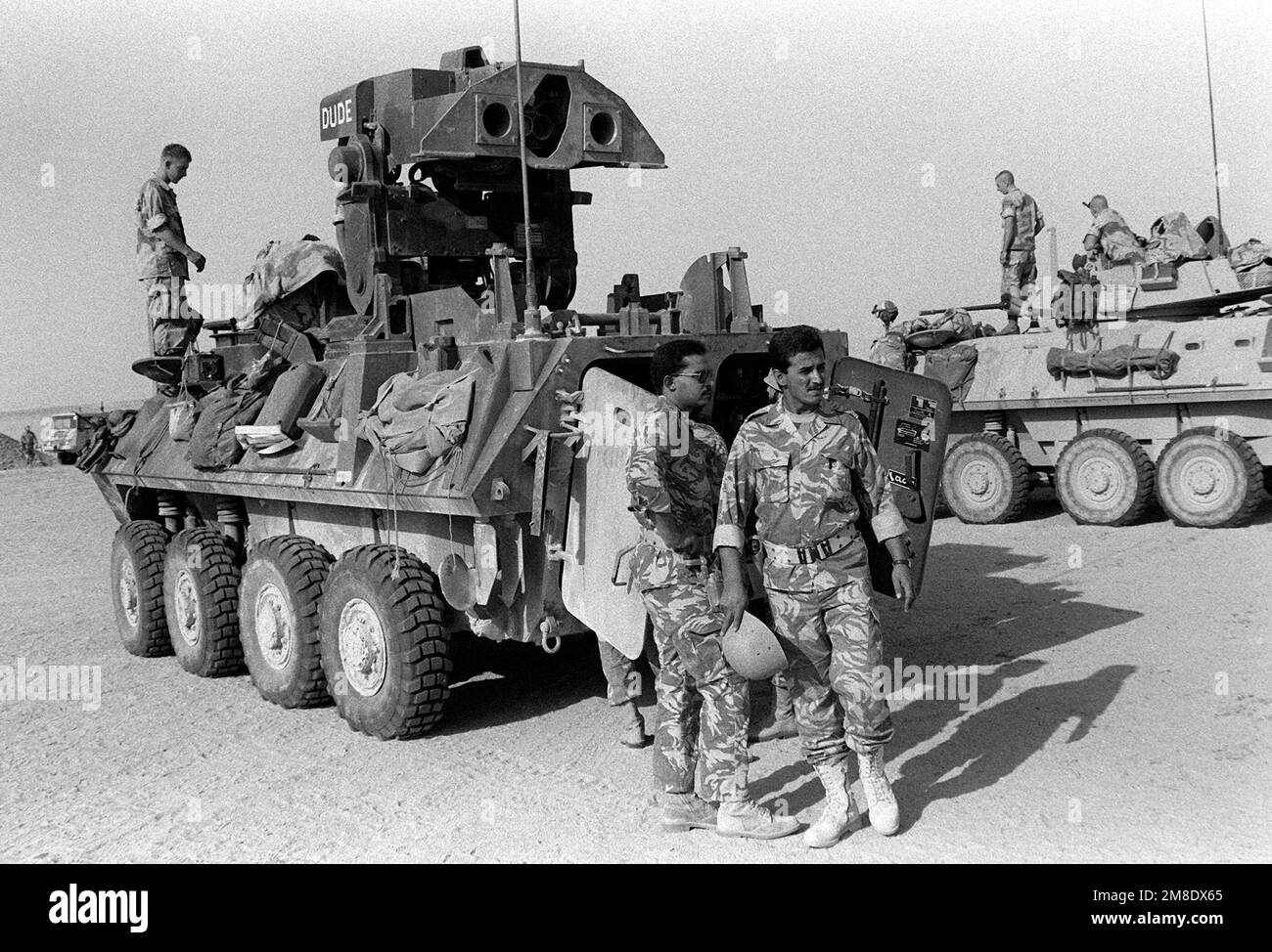 Saudi national guardsmen look at an LAV-AT light armored anti-tank ...