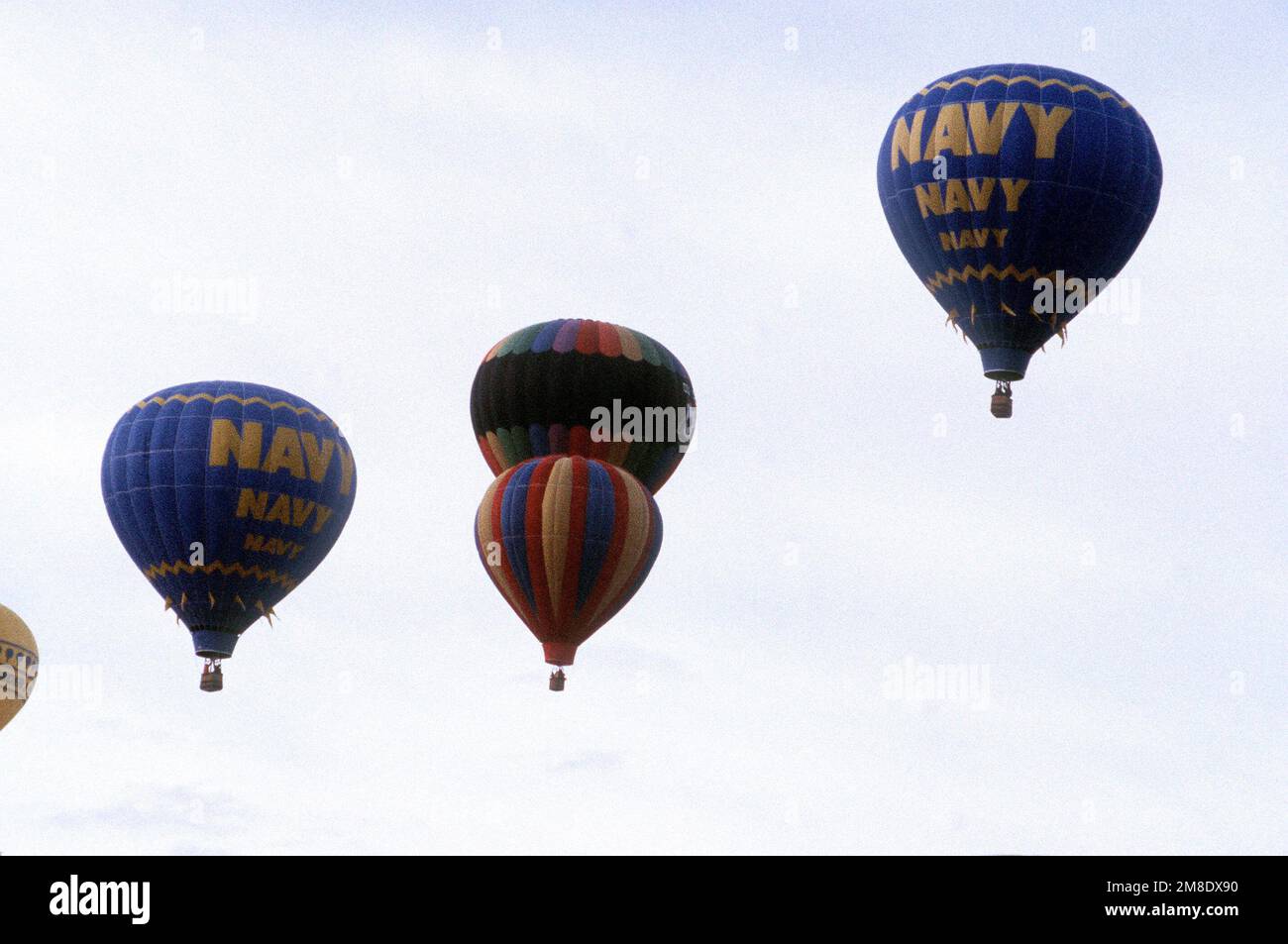 A U.S. Navy hot air balloons and commercial balloons take part in a ...