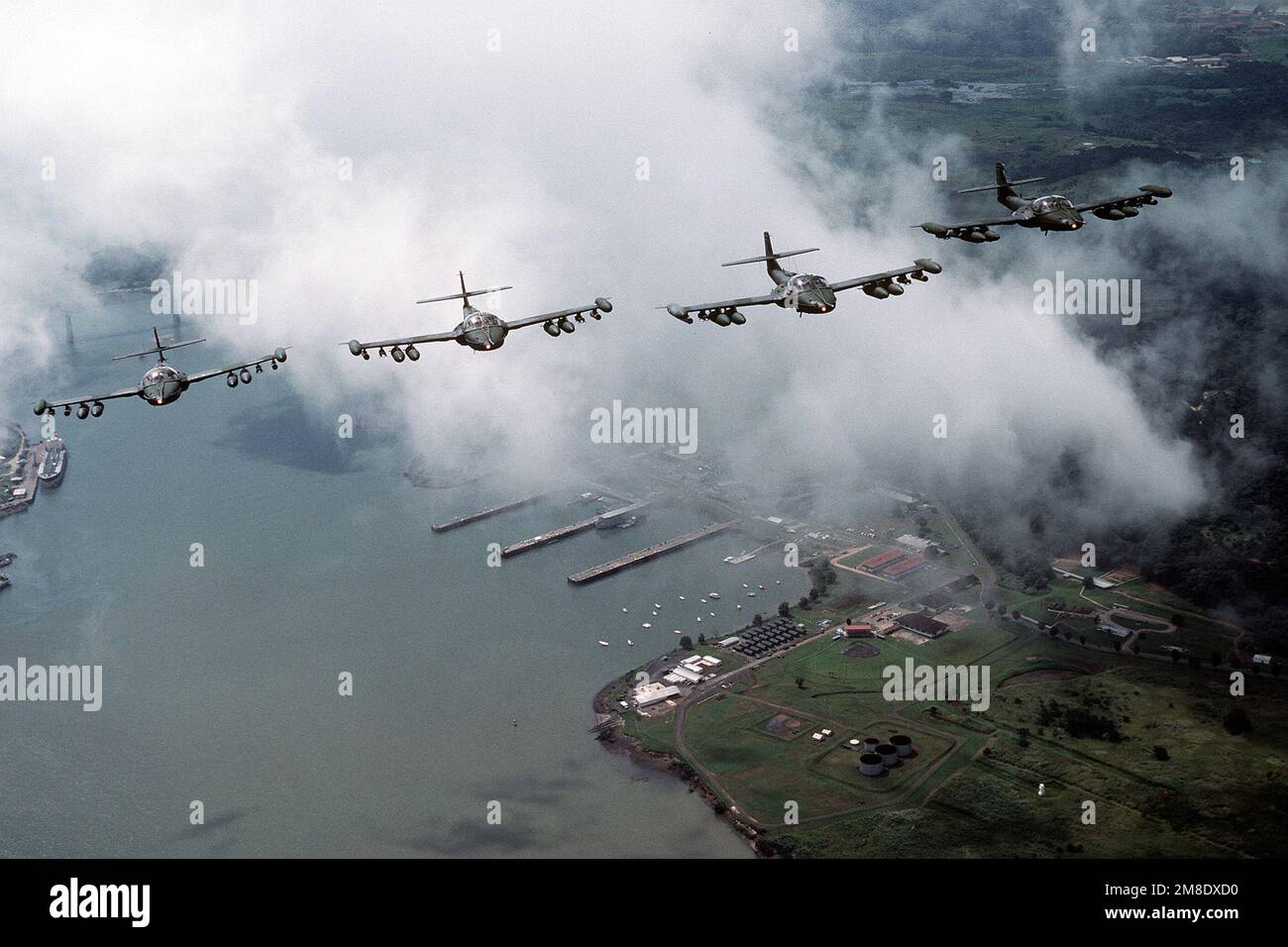 An air-to-air front view of OA-37B Dragonfly aircraft in formation ...