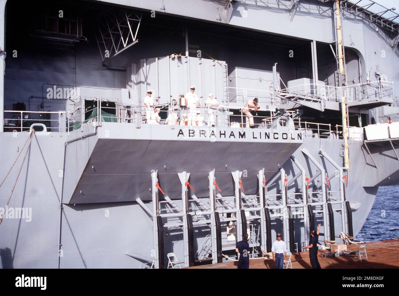 A chief petty officer on the fantail of the nuclear-powered aircraft ...