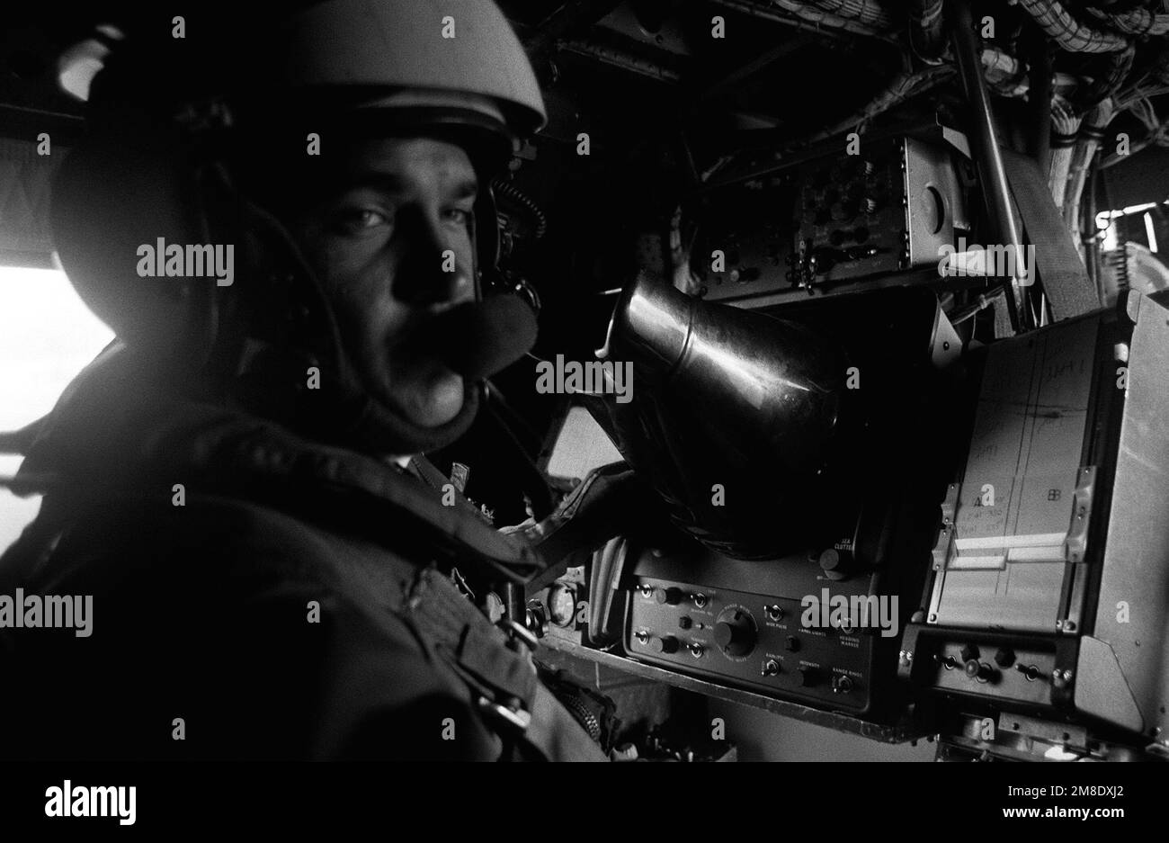 The systems operator monitors equipment in a Helicopter Light Anti ...