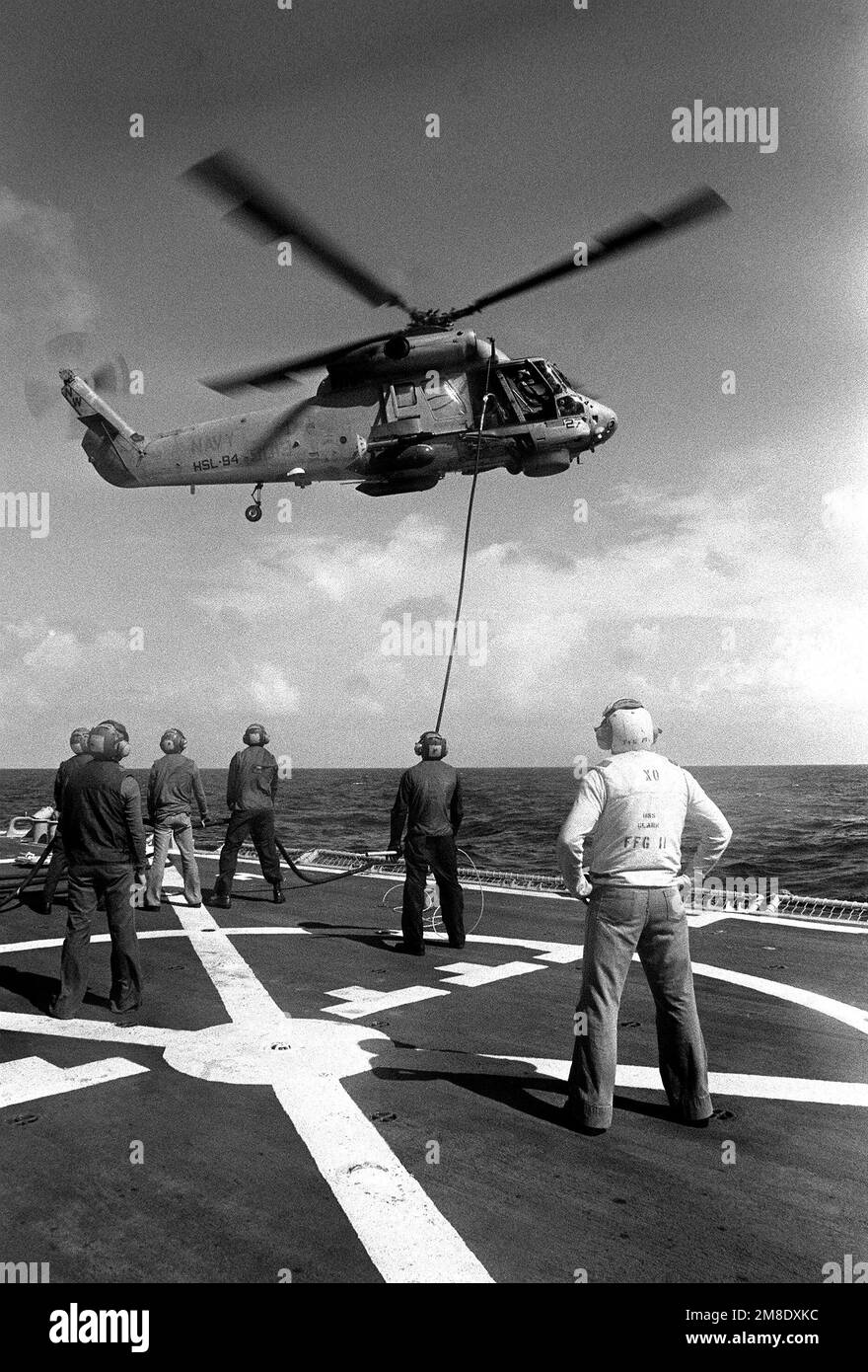 Squadron members stand by as a Helicopter Light Anti-submarine Squadron ...