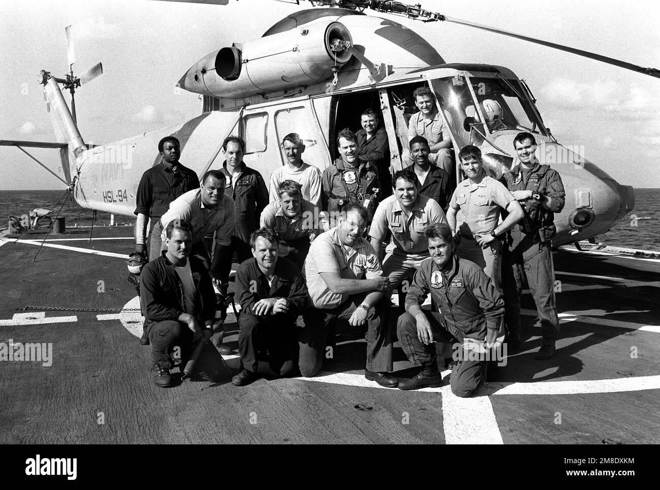 Members of Helicopter Light Anti-submarine Squadron 94 (HSL 94) pose ...
