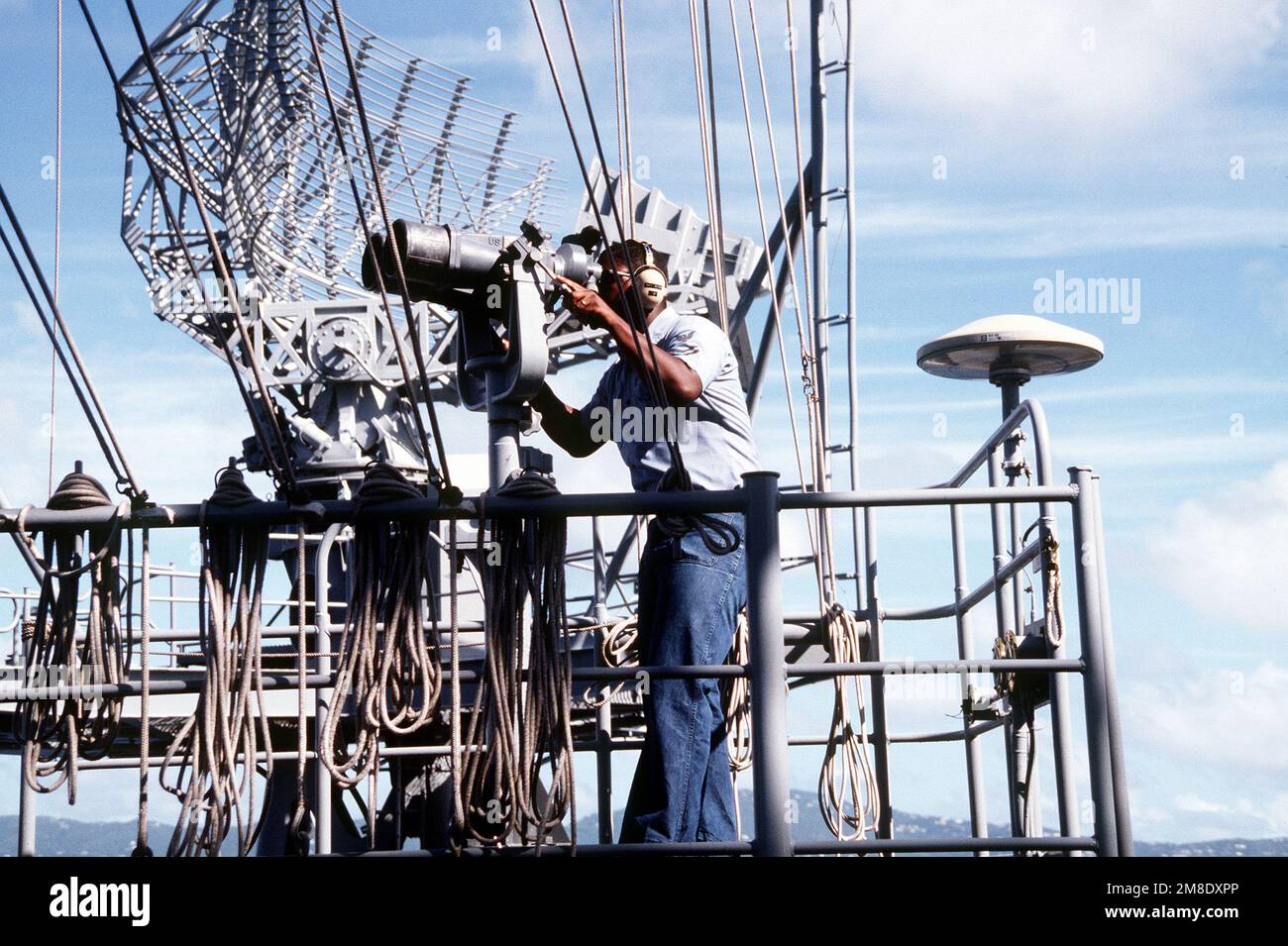 A lookout on the signal bridge aboard the nuclear-powered aircraft ...