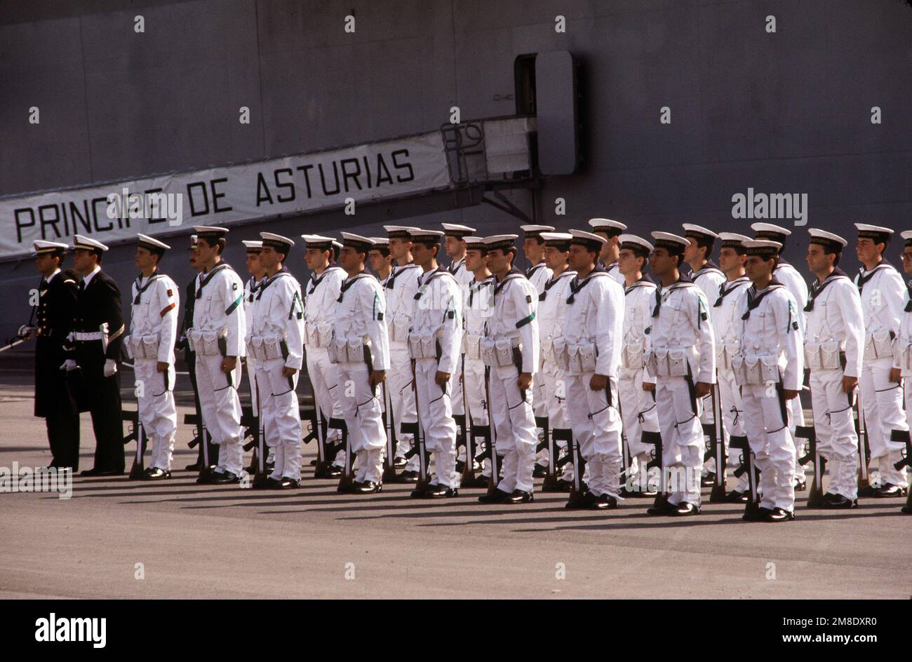 Sailors of the Spanish navy stand in formation on the pier during an ...