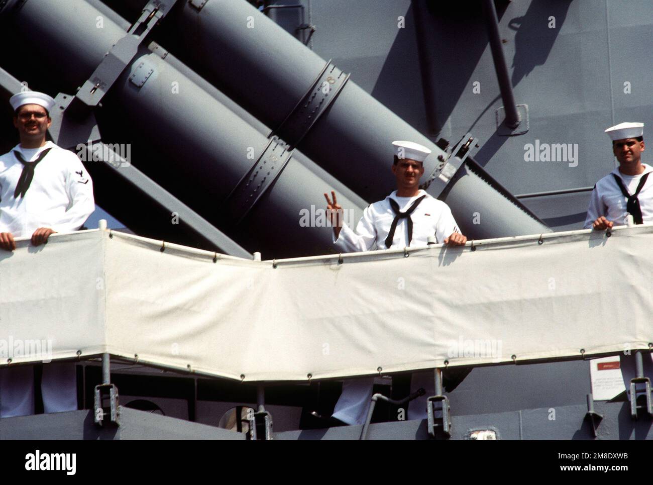 Crew Members Aboard The Guided Missile Cruiser Uss Belknap Cg 26