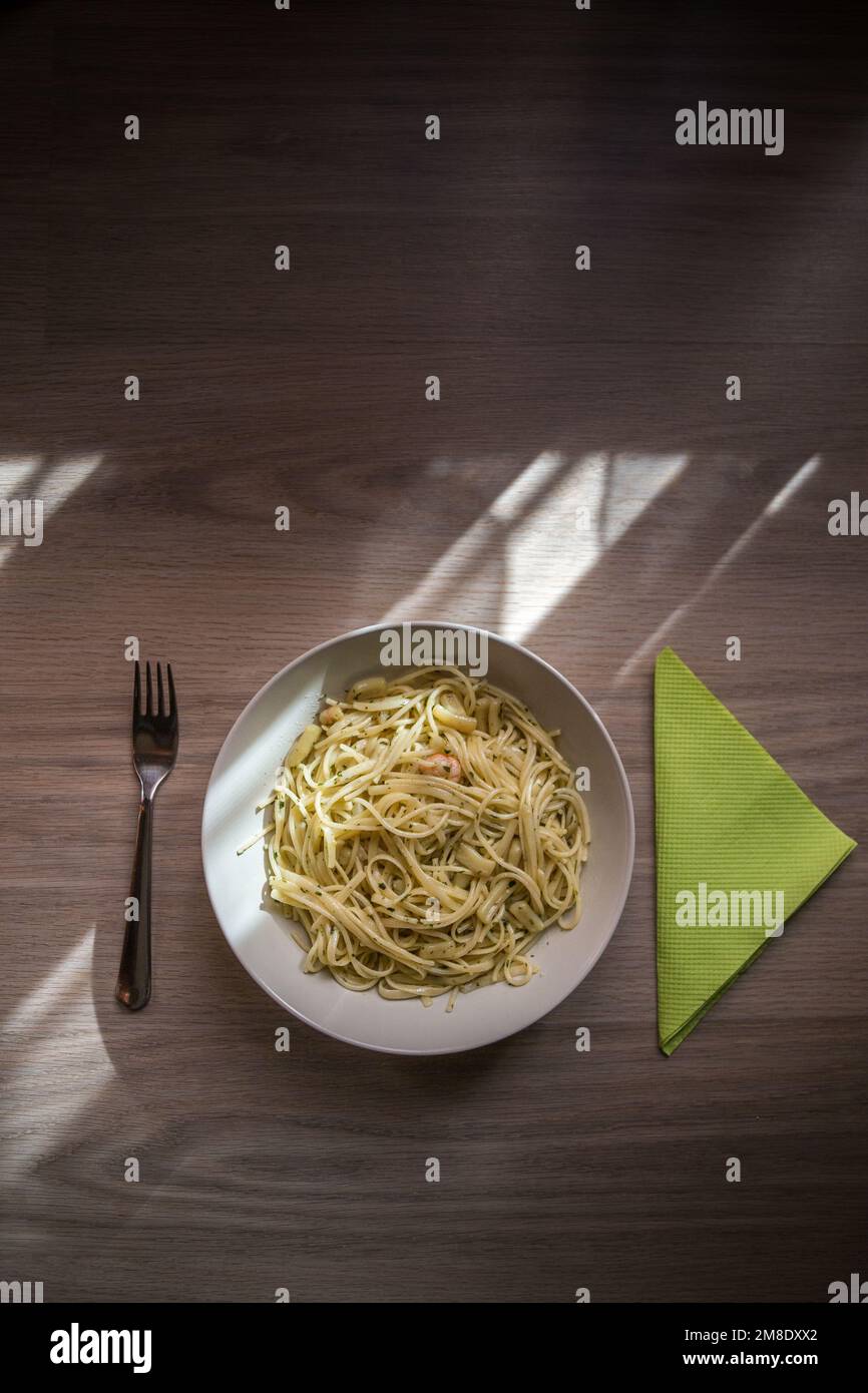 Dish of spaghetti with fish and prawns Stock Photo - Alamy