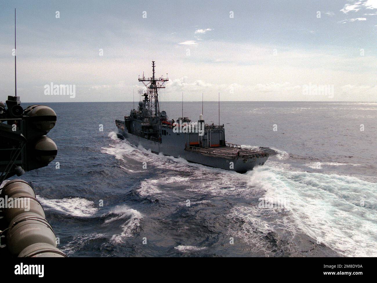 A port quarter view of the guided missile frigate USS DOYLE (FFG-39) as ...