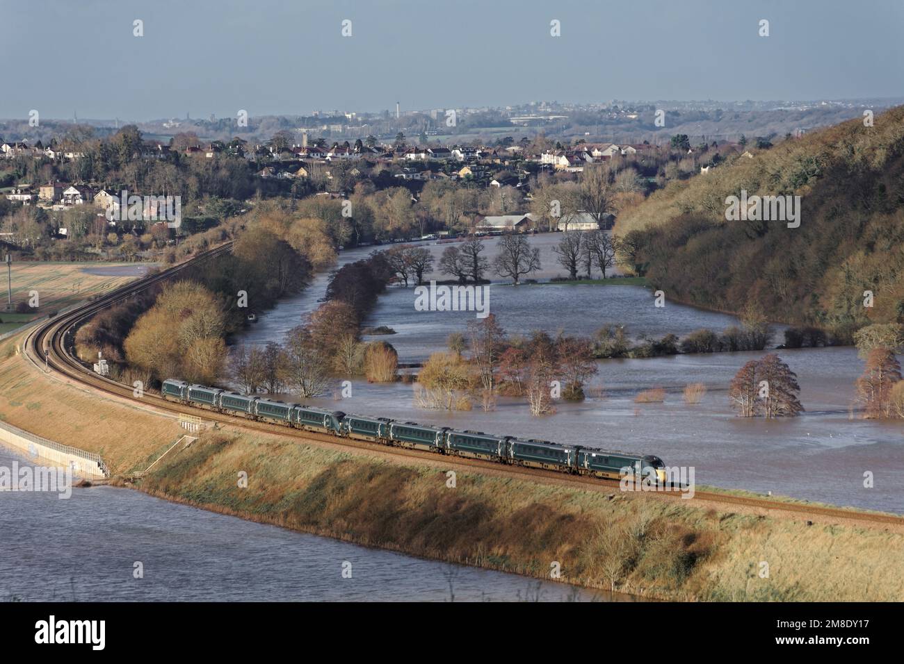 railway line above the flooded fields of Newton Meadows between Bath ...