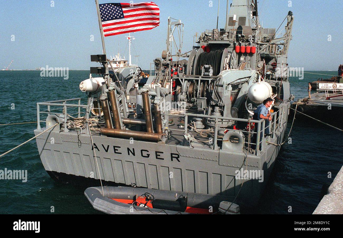 The mine countermeasures ship USS AVENGER is moored to the pier after ...