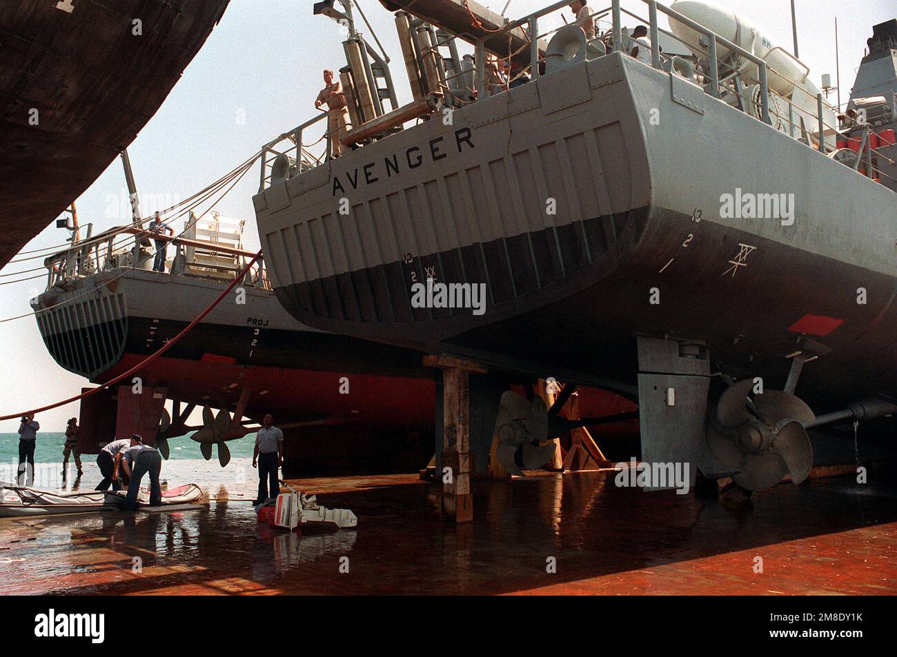 Crew members aboard the Dutch heavy lift ship SUPER SERVANT 3 ready the ...