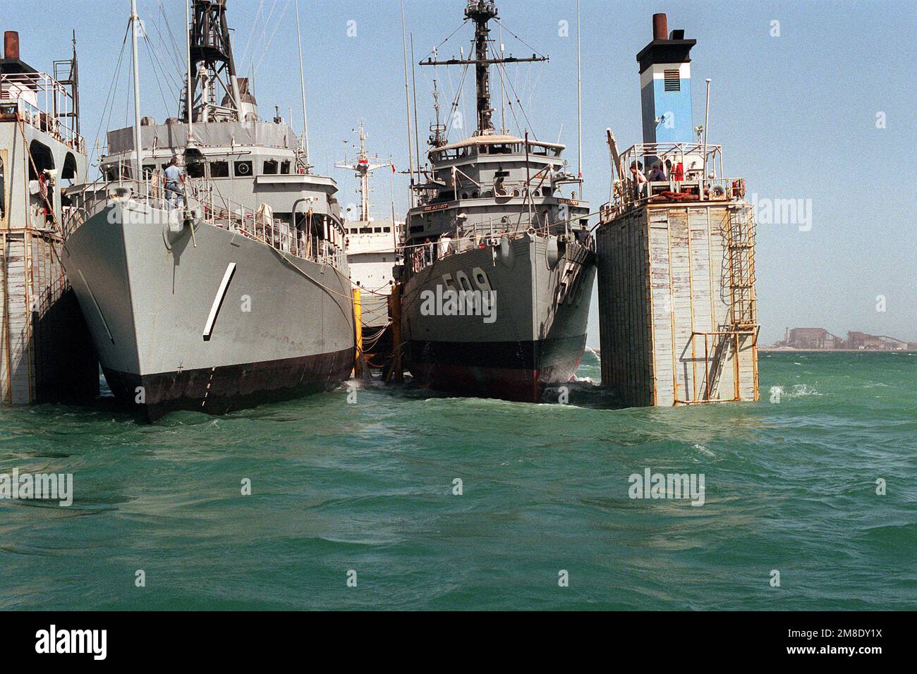 The mine countermeasures ship USS AVENGER (MCM-1) and the ocean ...