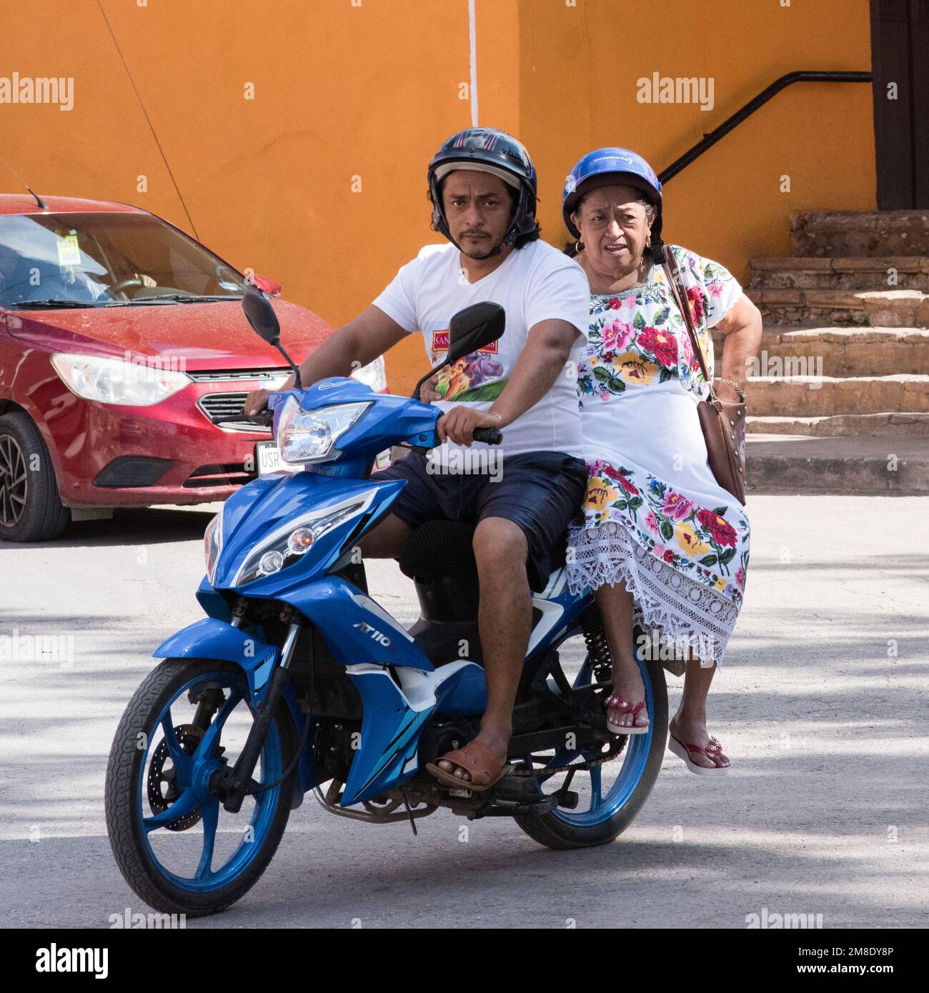 Mother and son riding a motorcycle , Espita Yucatan Stock Photo - Alamy