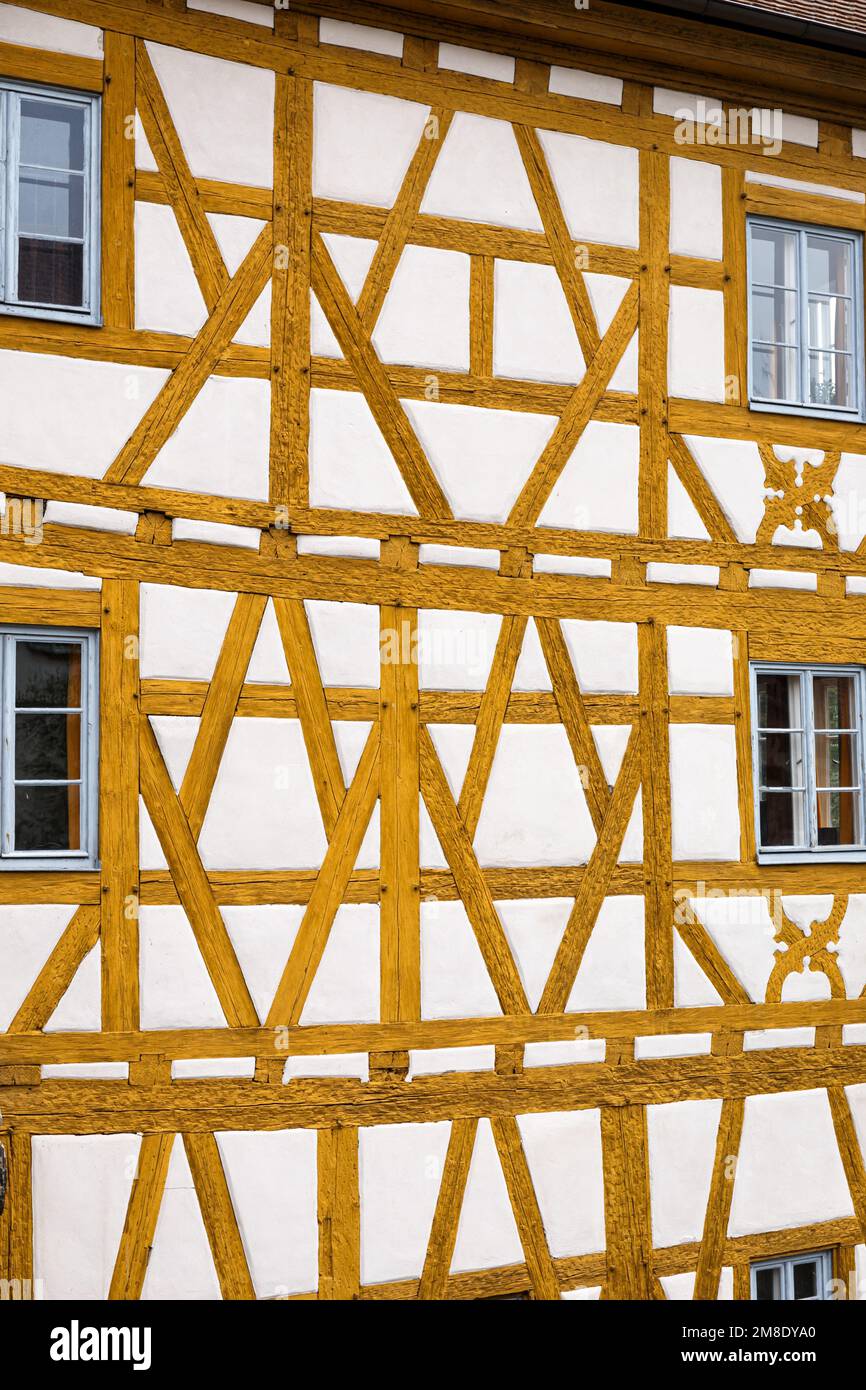 A vertical shot of the fachwerk facade of an old medieval house in ...