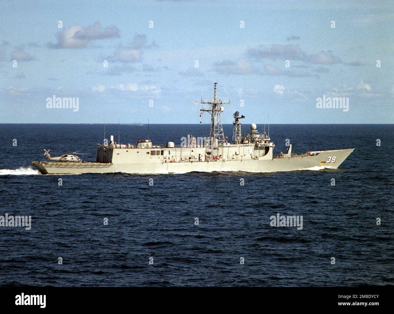 A starboard beam view of the guided missile frigate USS DOYLE (FFG-39 ...