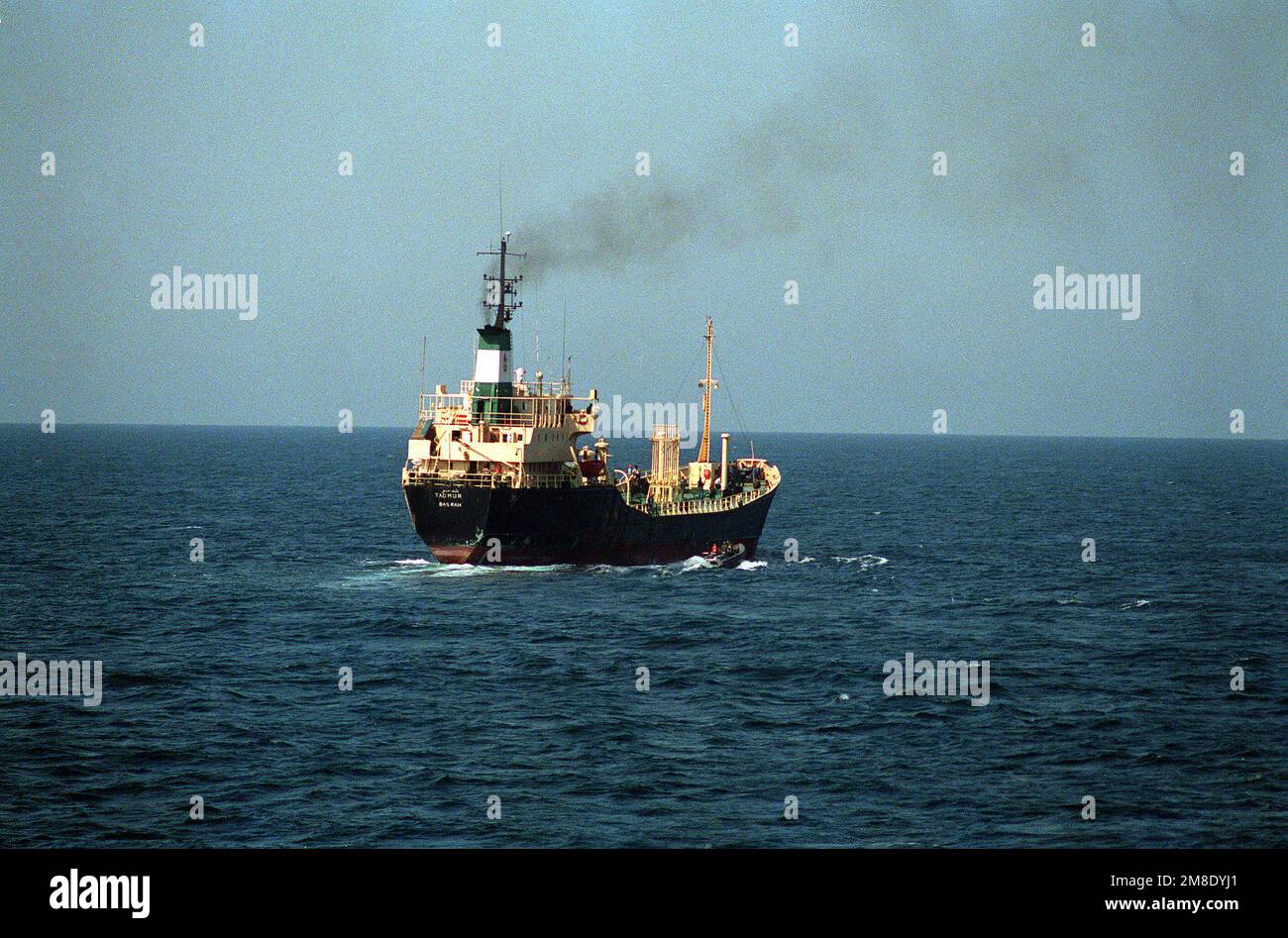 A starboard quarter view of the Iraqi ship TADMUR as an Allied ...
