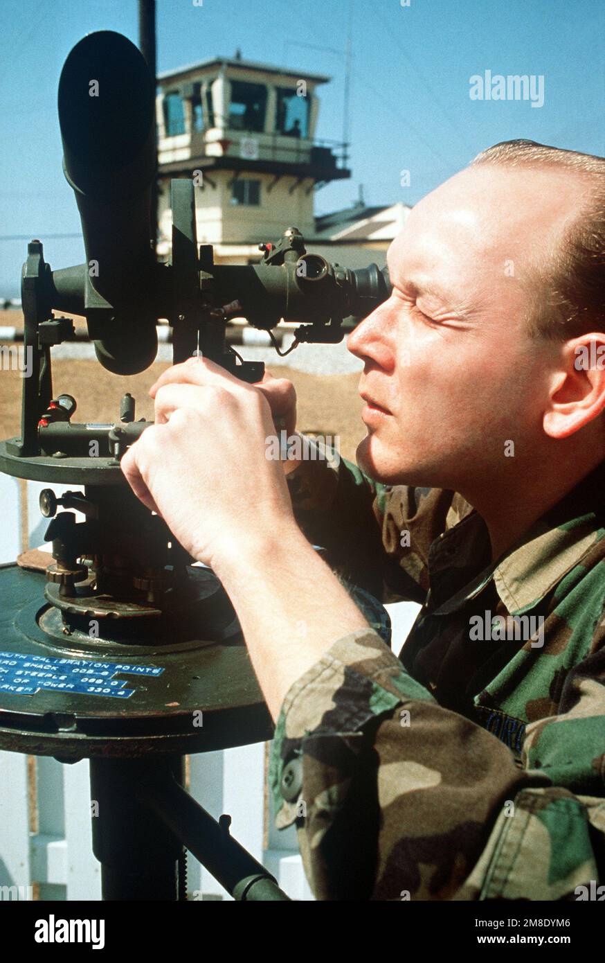 An Air Force weatherman tracks a balloon released at the Koon-Ni ...