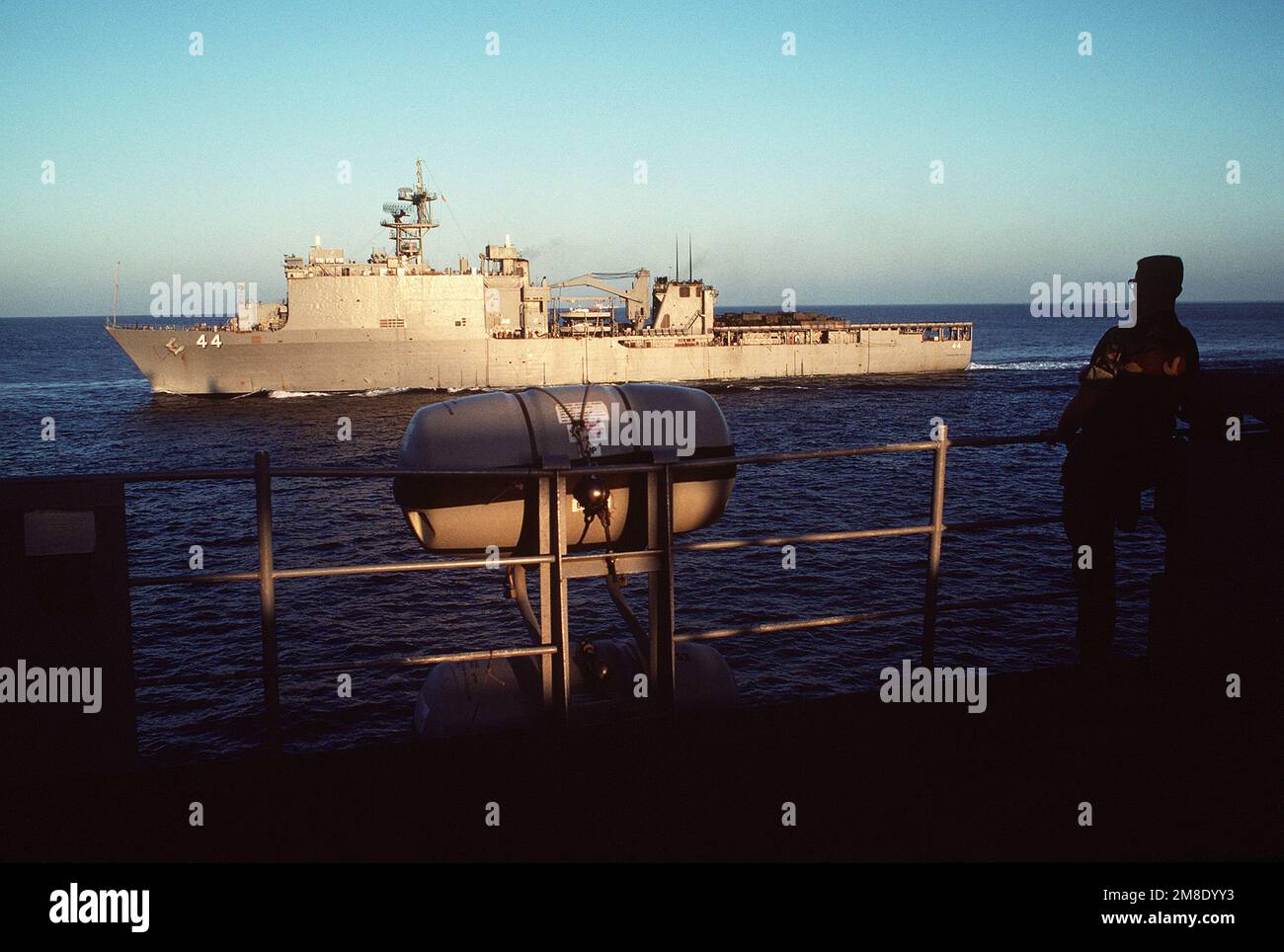 A Marine aboard the amphibious transport dock USS RALEIGH (LPD-1 ...