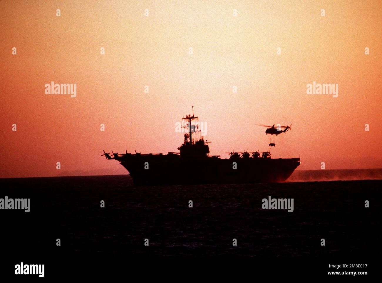 A CH-53E Super Stallion helicopter lifts an external load from the ...