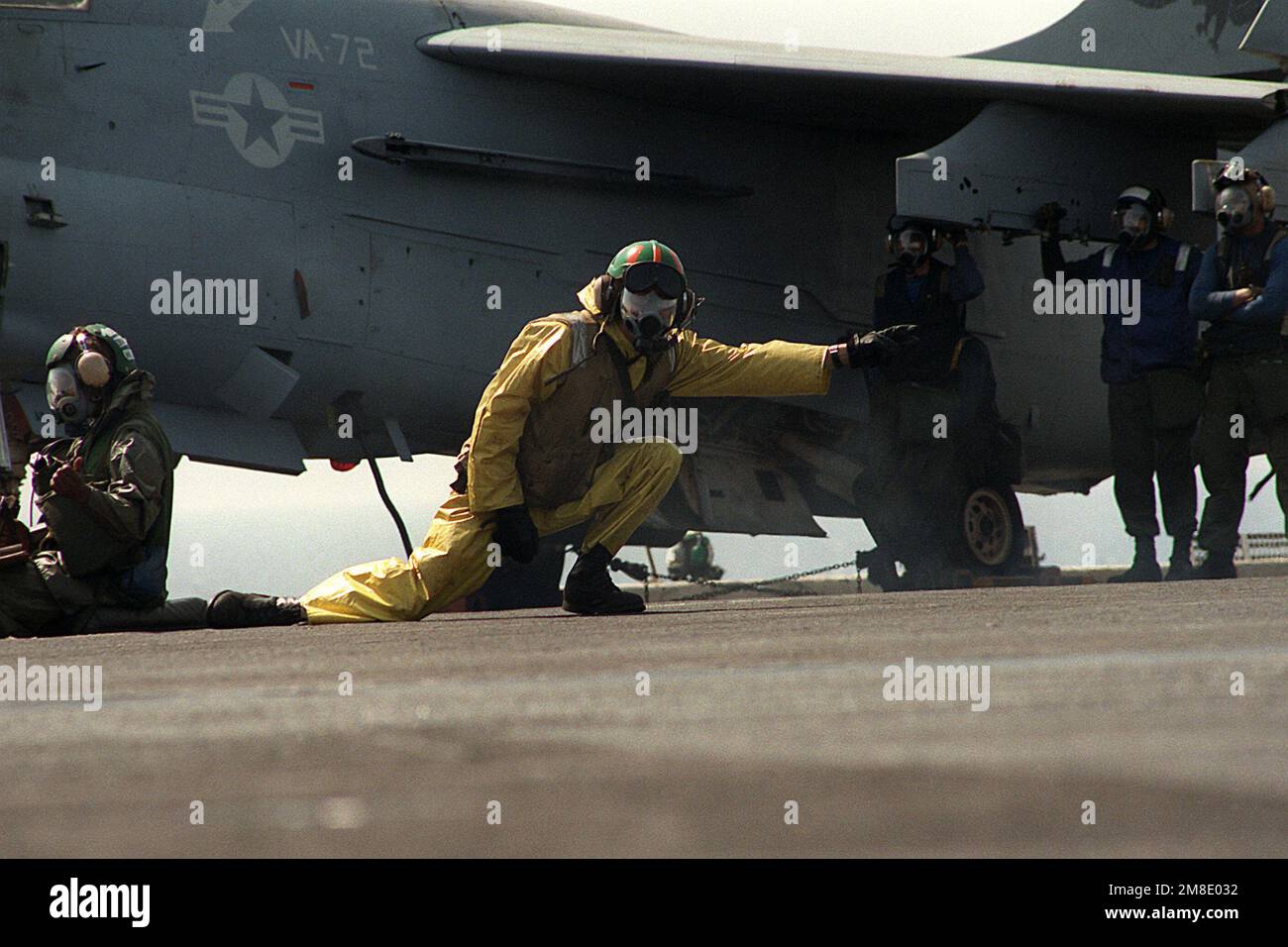 Wearing an MCU-2P protective mask as part of a Nuclear-Biological ...