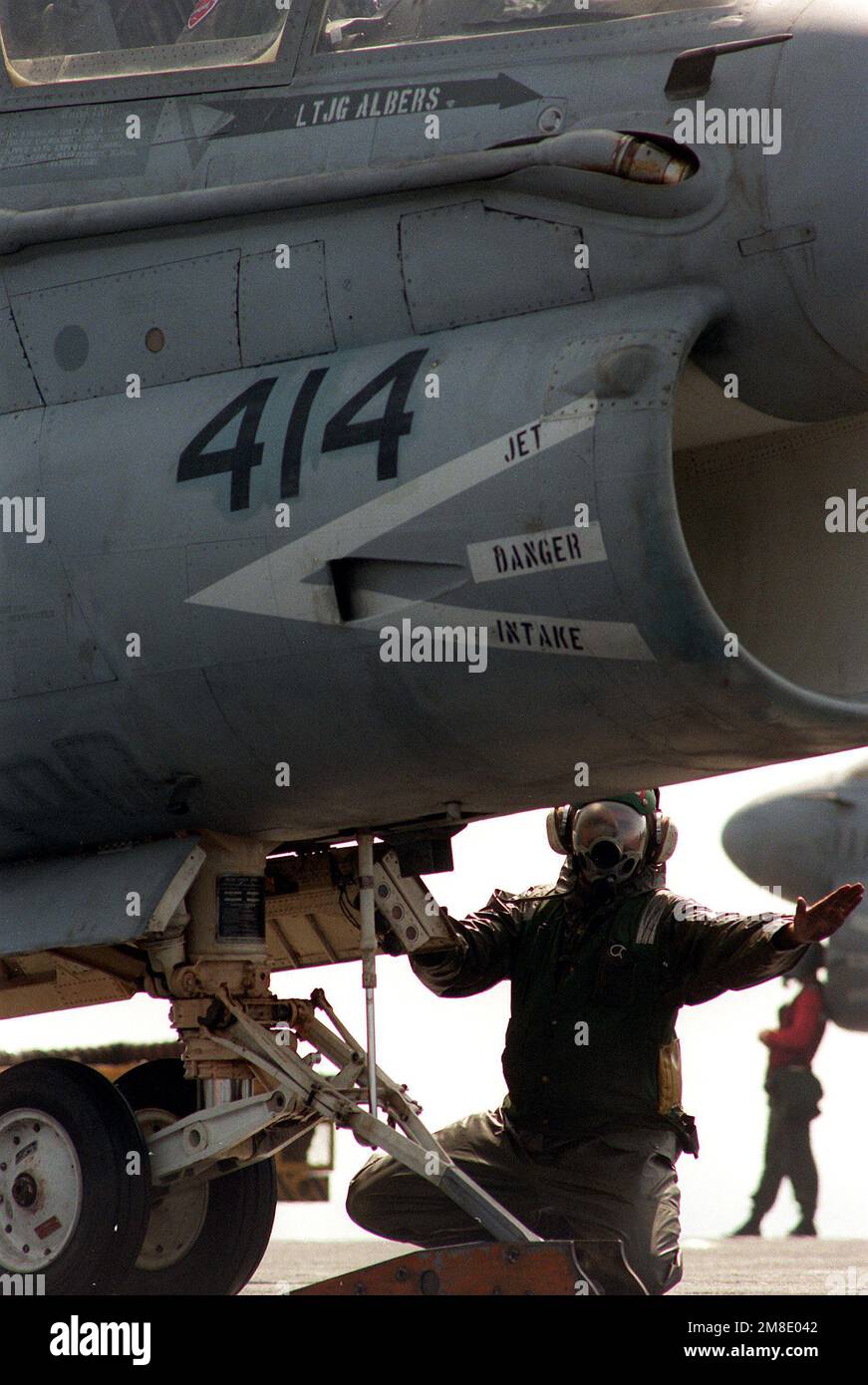 Wearing an MCU-2P protective mask as part of a nuclear-biological ...