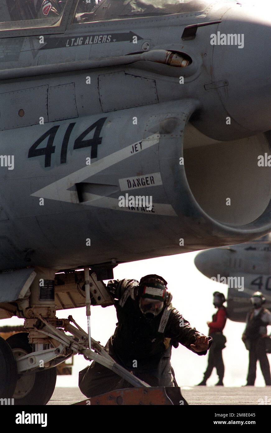 Wearing an MCU-2P protective mask as part of a nuclear-biological ...