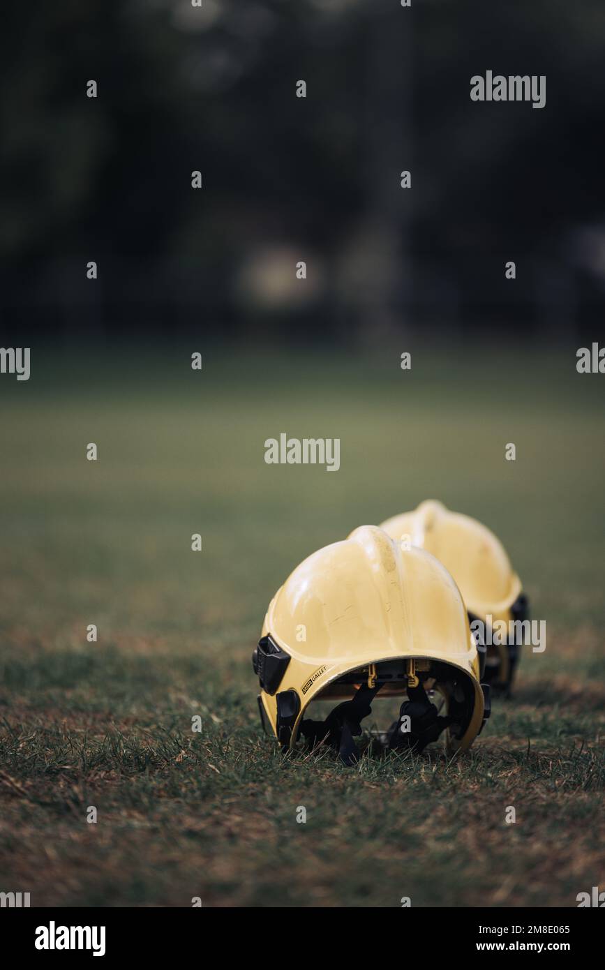The safety helmets on the ground during fire and rescue services ...