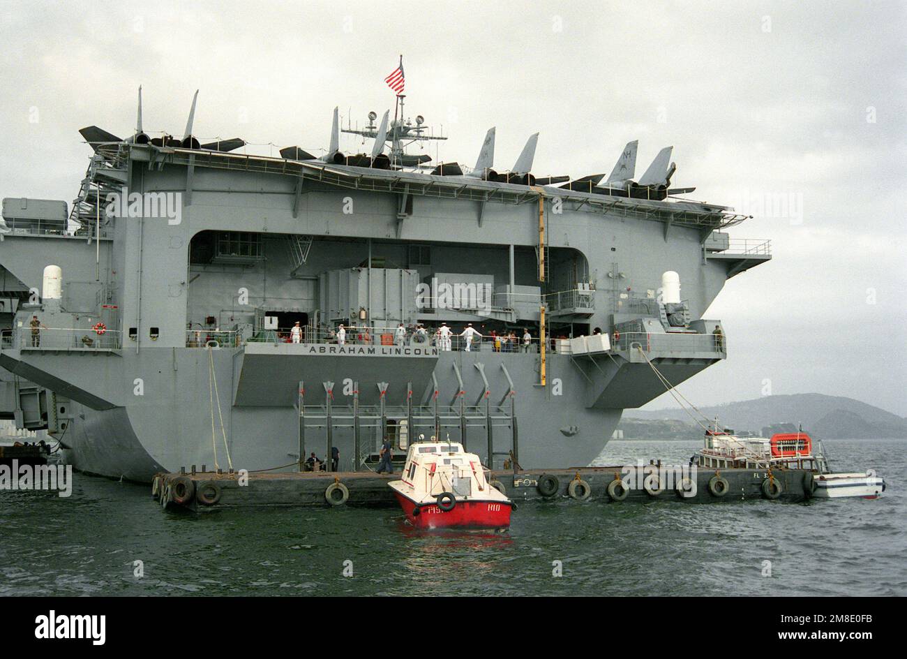 A close-up view of the stern of the nuclear-powered aircraft carrier ...