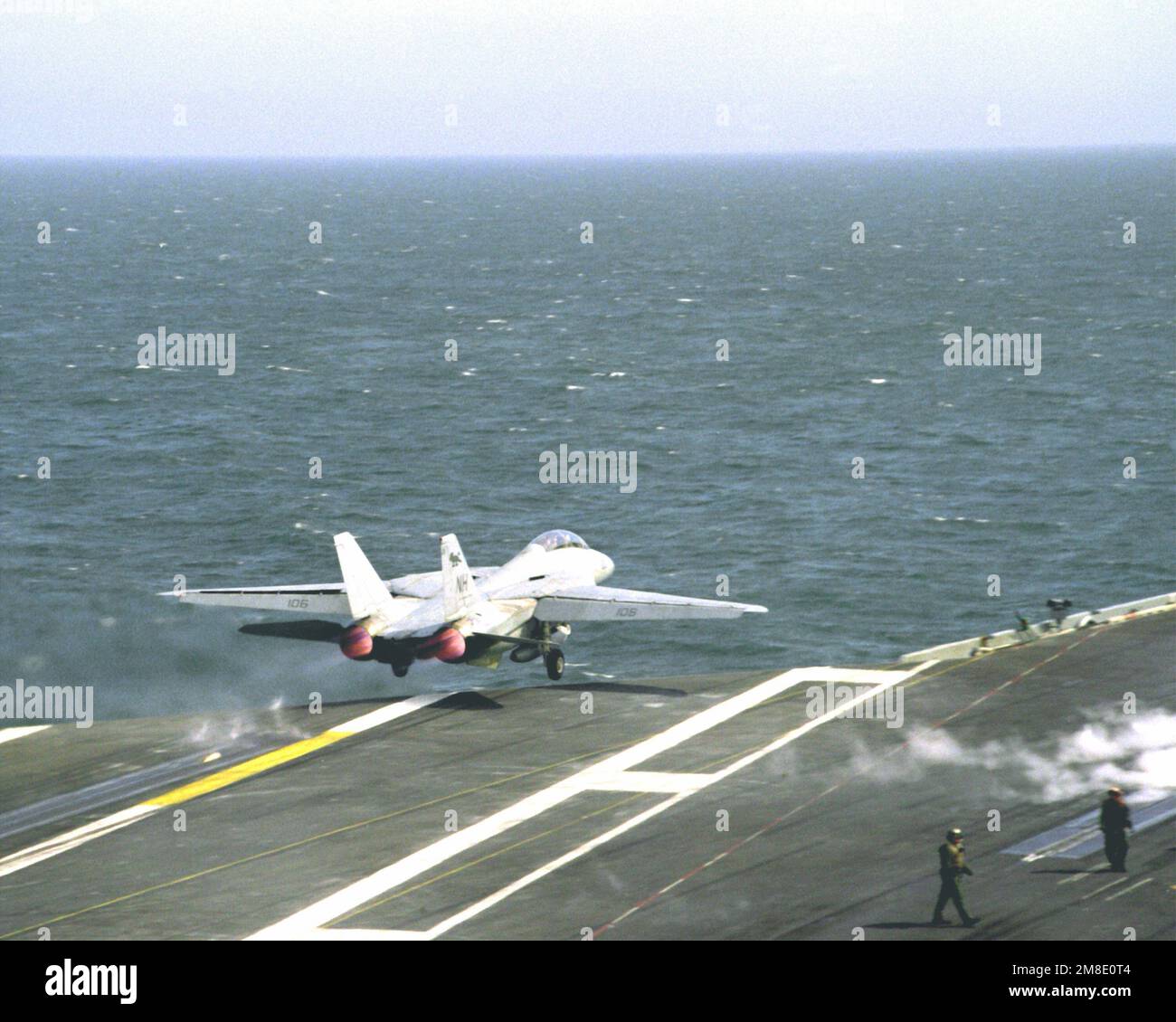 A Fighter Squadron 114 (VF-114) F-14A Tomcat aircraft clears the flight ...