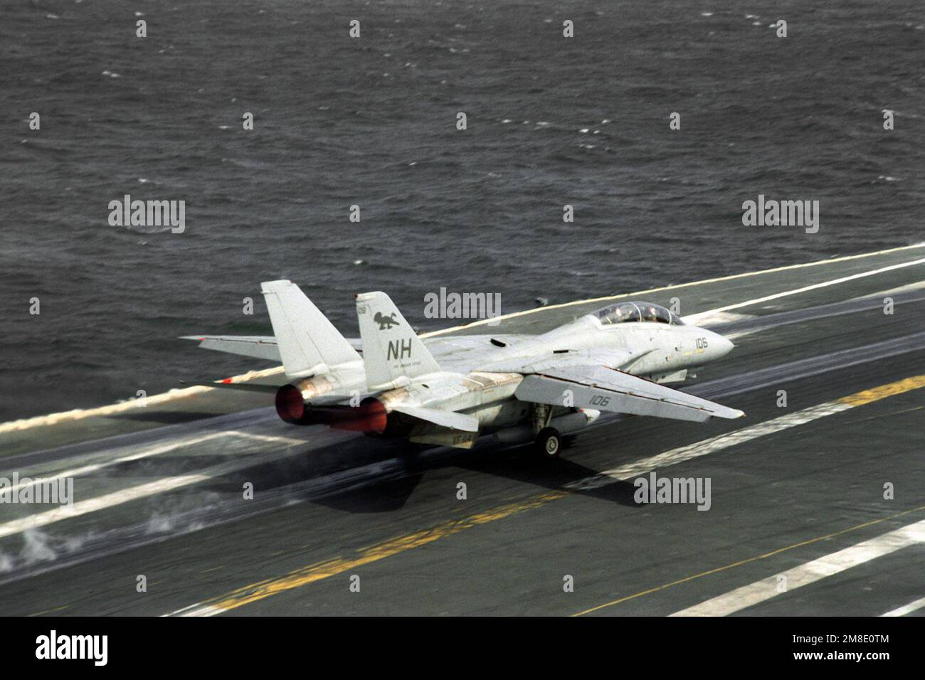 A Fighter Squadron 114 (VF-114) F-14A Tomcat aircraft is launched from ...