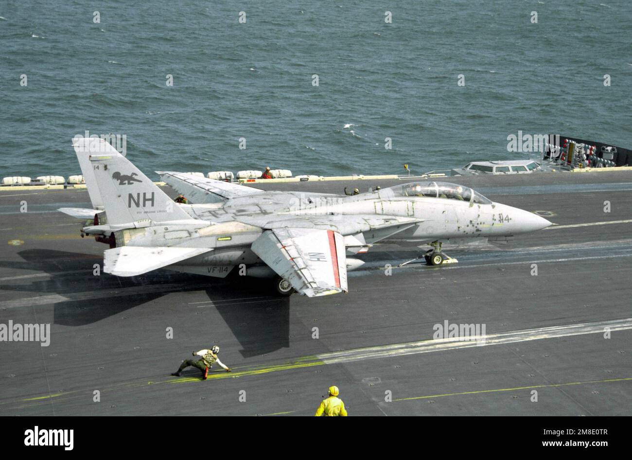 A Fighter Squadron 114 (VF-114) F-14A Tomcat aircraft is launched from ...