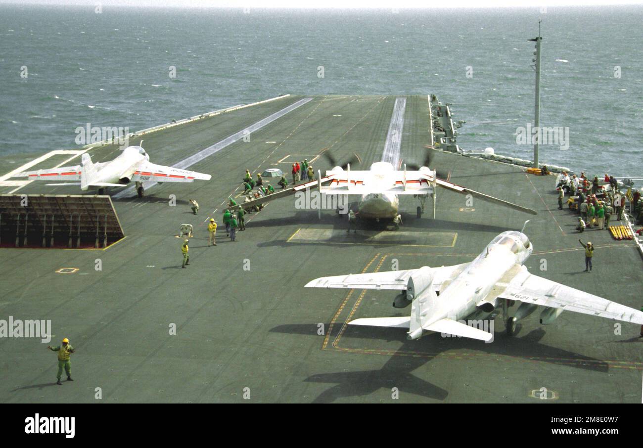 An Attack Squadron 95 (VA-95) A-6E Intruder aircraft, left, and a Fleet ...