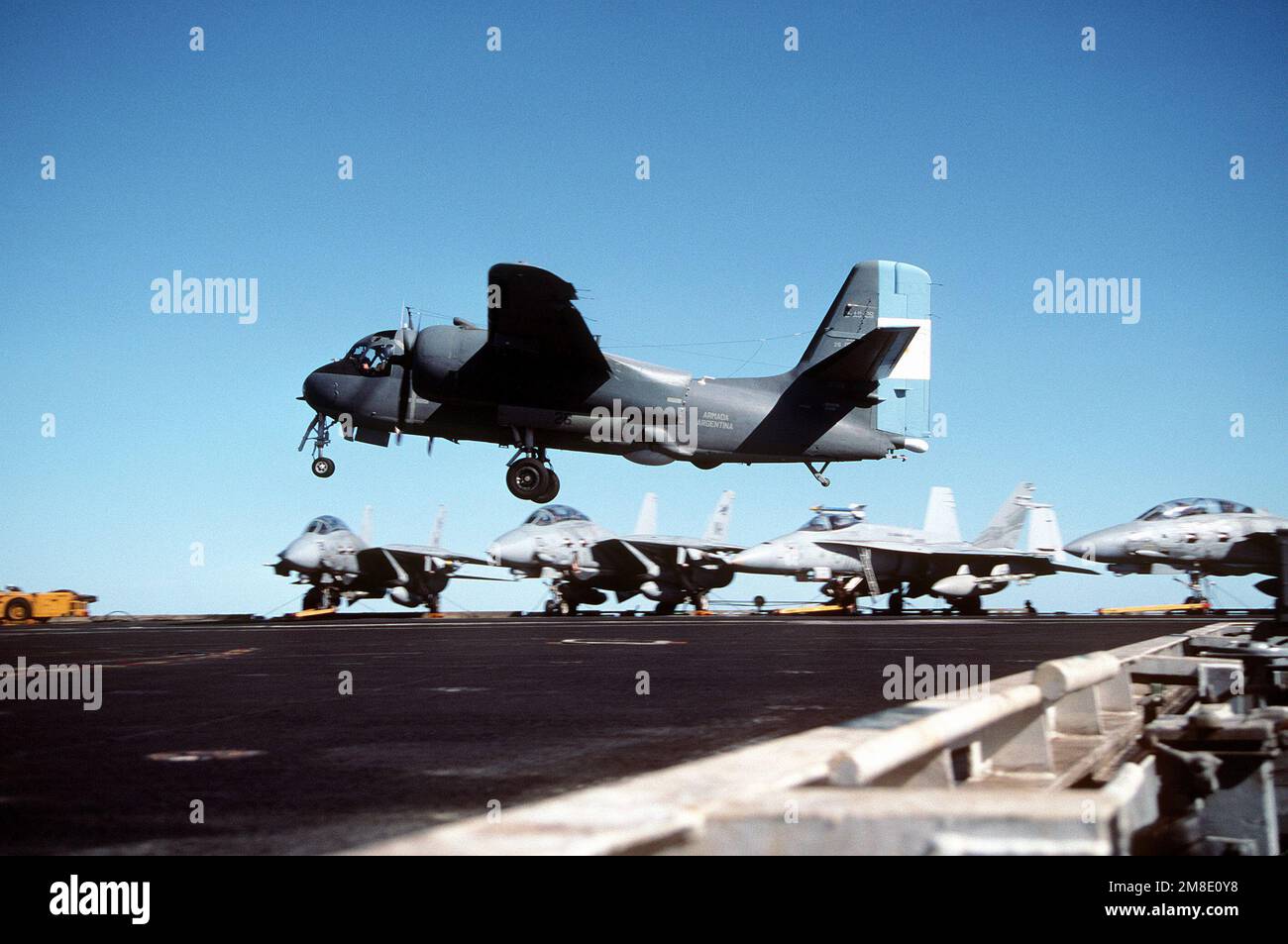 An Argentine navy S-2E Tracker aircraft lands on the nuclear-powered ...