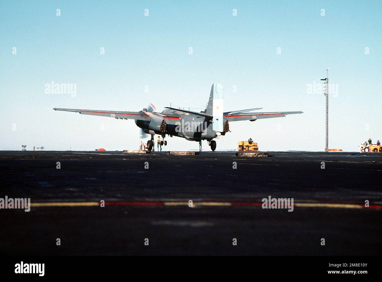 An Argentine navy S-2E Tracker aircraft lands on the flight deck of the ...