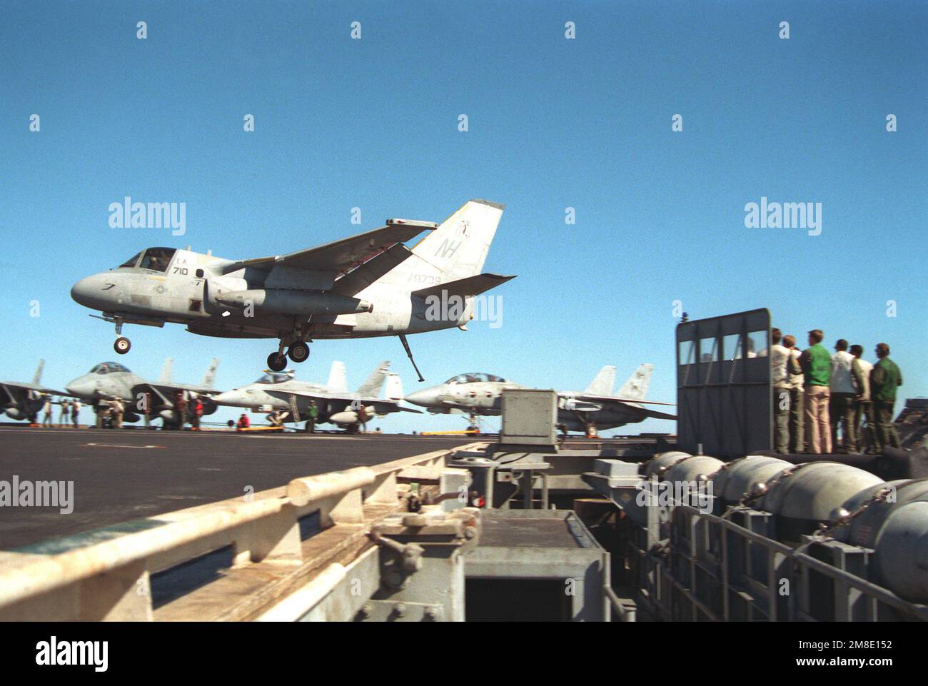 Landing signal officers stand by as an Air Anti-submarine Squadron 29 ...