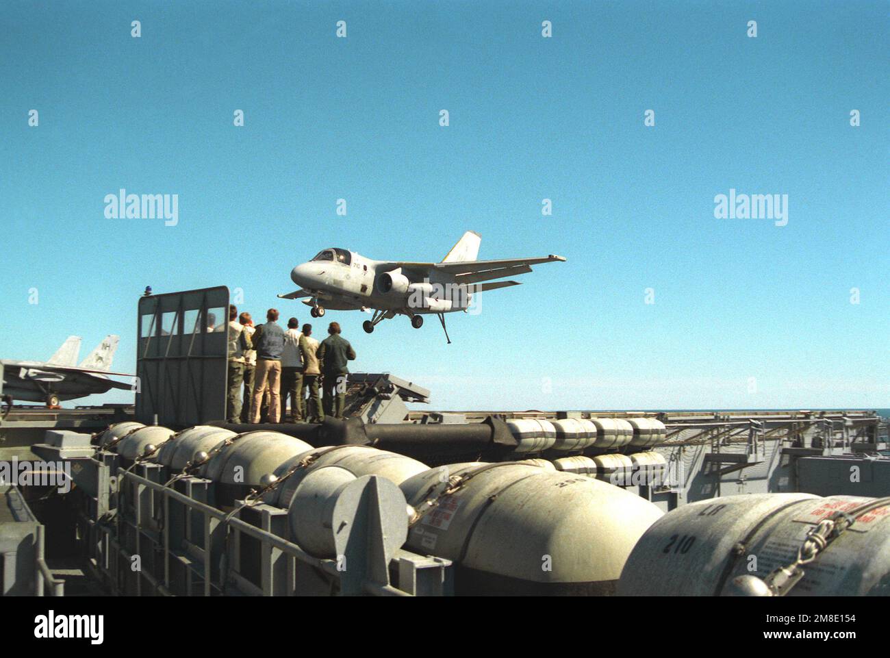 Landing signal officers stand by as an Air Anti-submarine Squadron 29 ...