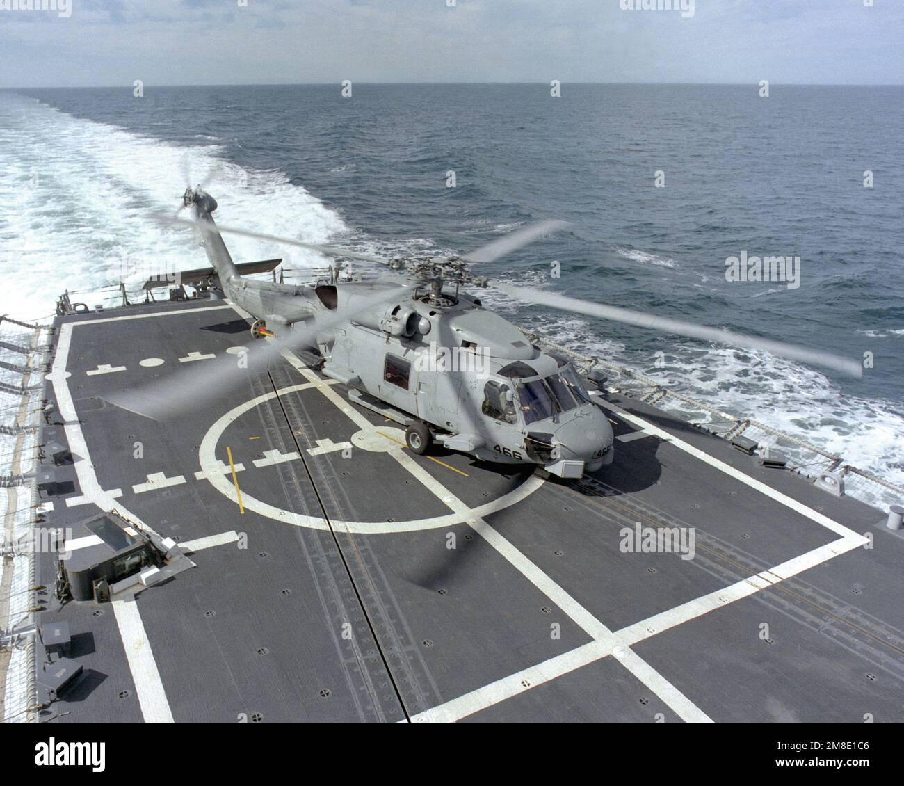 An SH-60B Sea Hawk helicopter prepares to take off from the flight deck ...