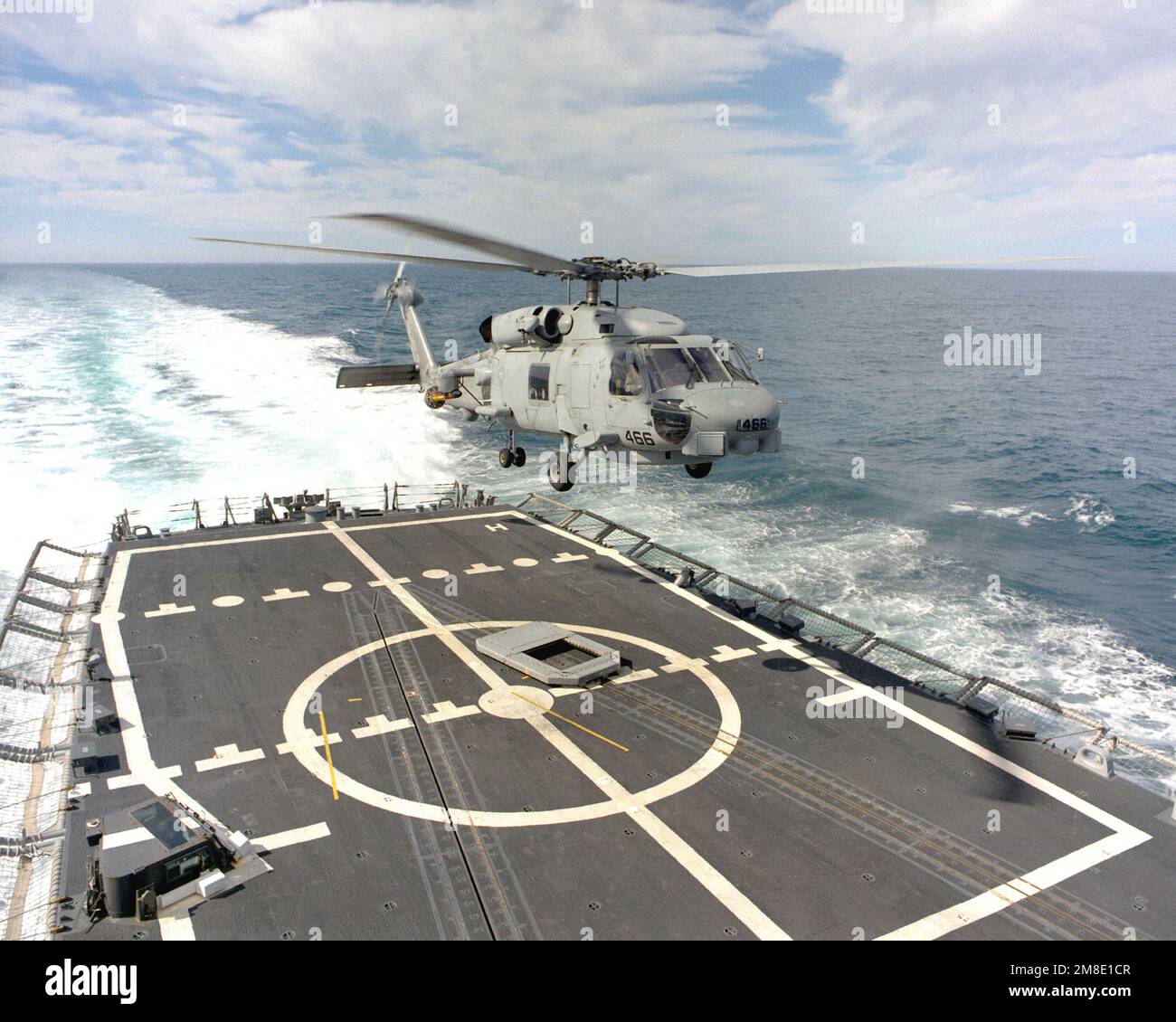 An SH-60B Sea Hawk helicopter takes off from the flight deck of the ...