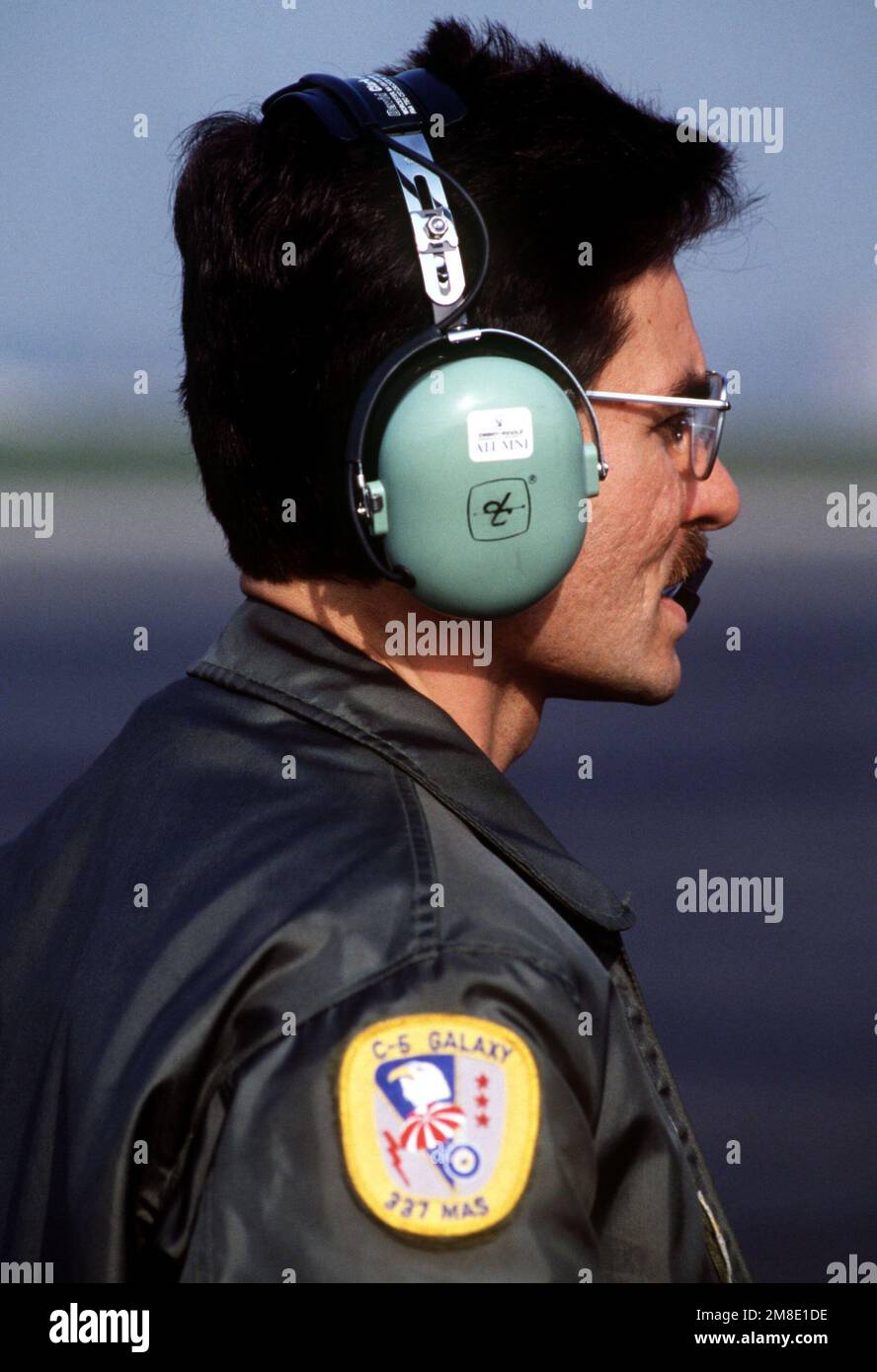 A airman from the 337th Military Airlift Squadron (337th MAS), U.S. Air ...