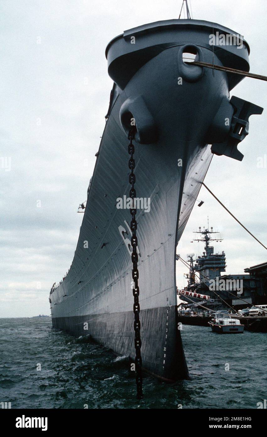 A close-up bow view of the battleship USS IOWA (BB 61) as it lies tied ...