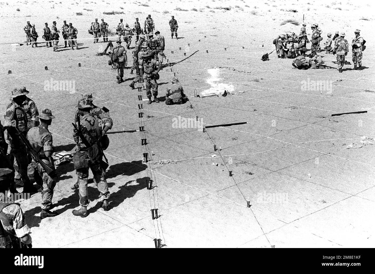 Marines of the 3rd Marine Regiment take part in a sand table command ...