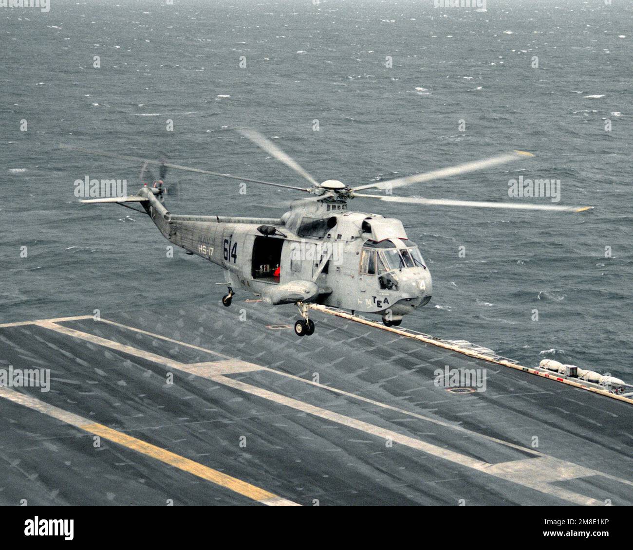 A Helicopter Anti-submarine Squadron 17 (HS-17) SH-3H Sea King ...